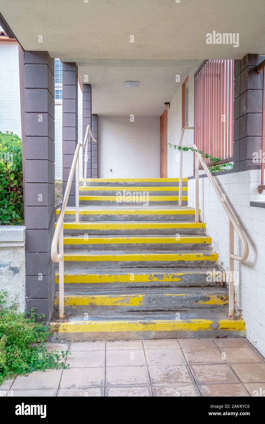 Exterior steps with yellow warning treads on a sunny day Stock Photo ...