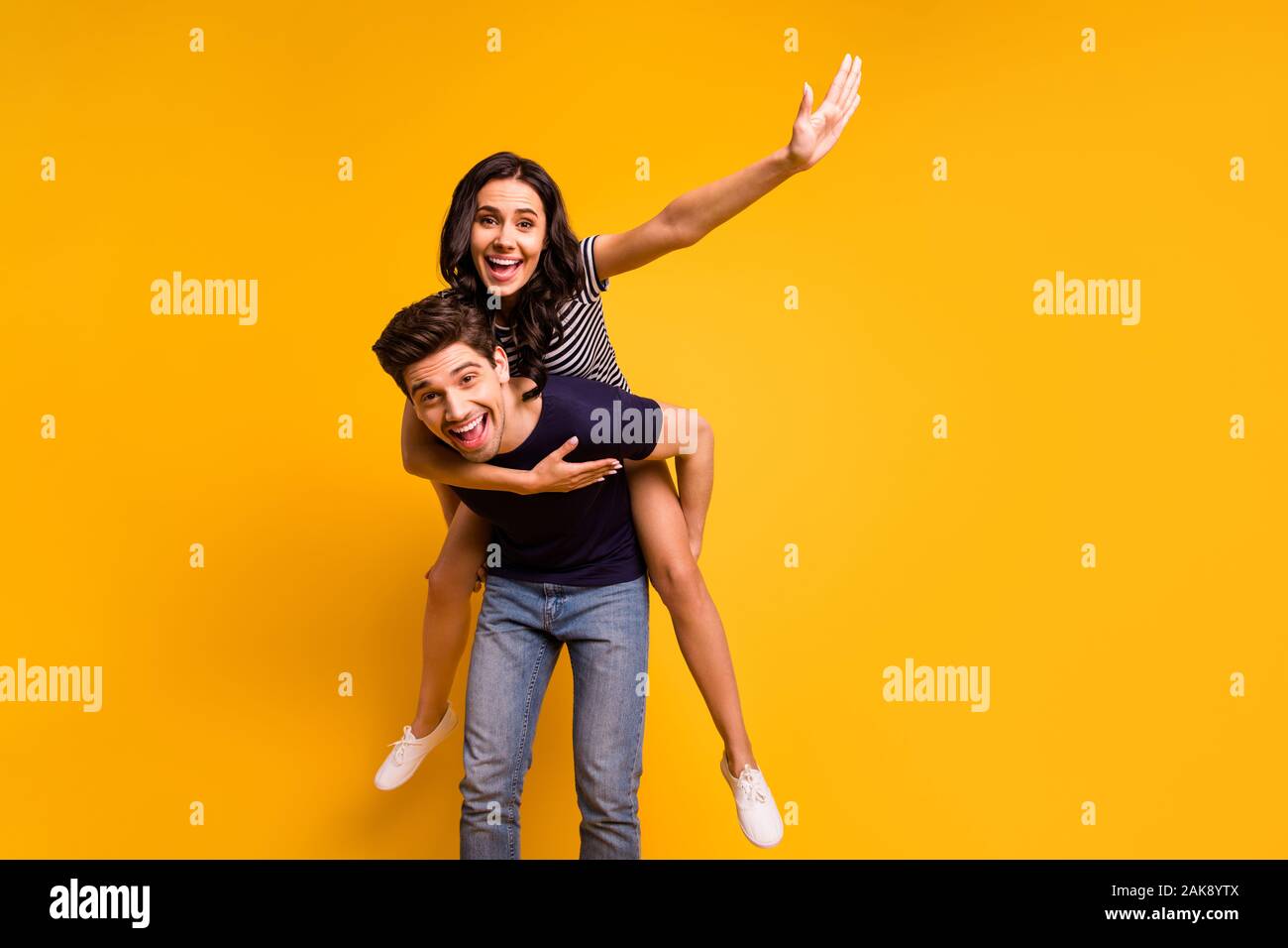 Photo of nice cheerful couple of two people wearing jeans denim and ...