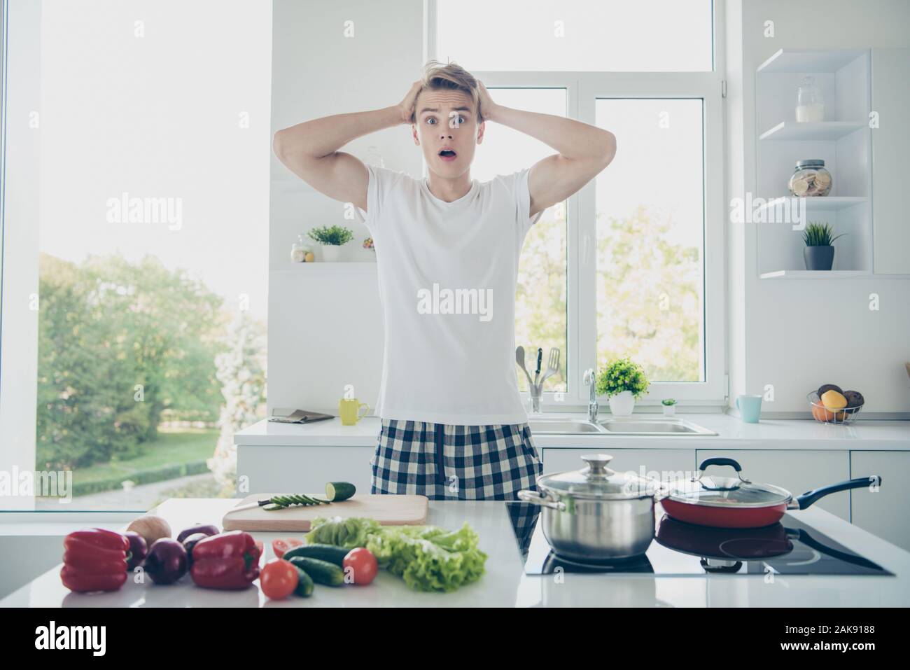 Portrait of his he nice attractive cute afraid shocked overwhelmed guy ...