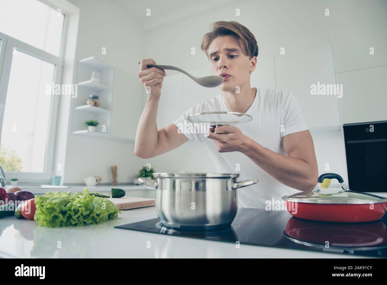 Portrait of his he nice attractive cute puzzled focused guy making ...
