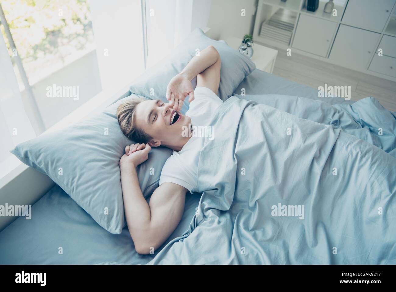 Top above high photo of positive cheerful brown haired man awake from ...