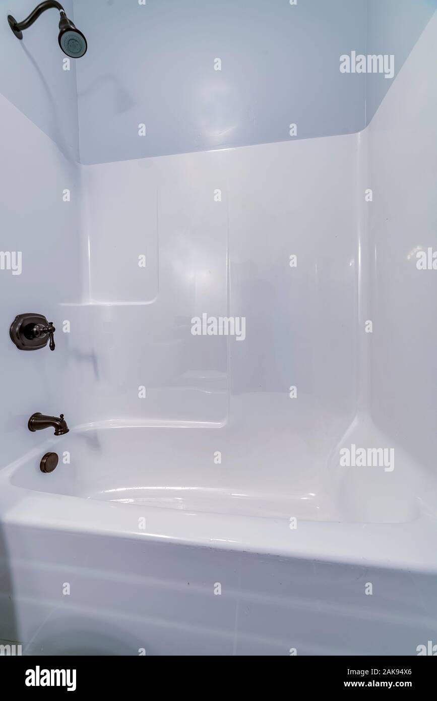 Modern interior fitted white tiled shower cubicle Stock Photo - Alamy