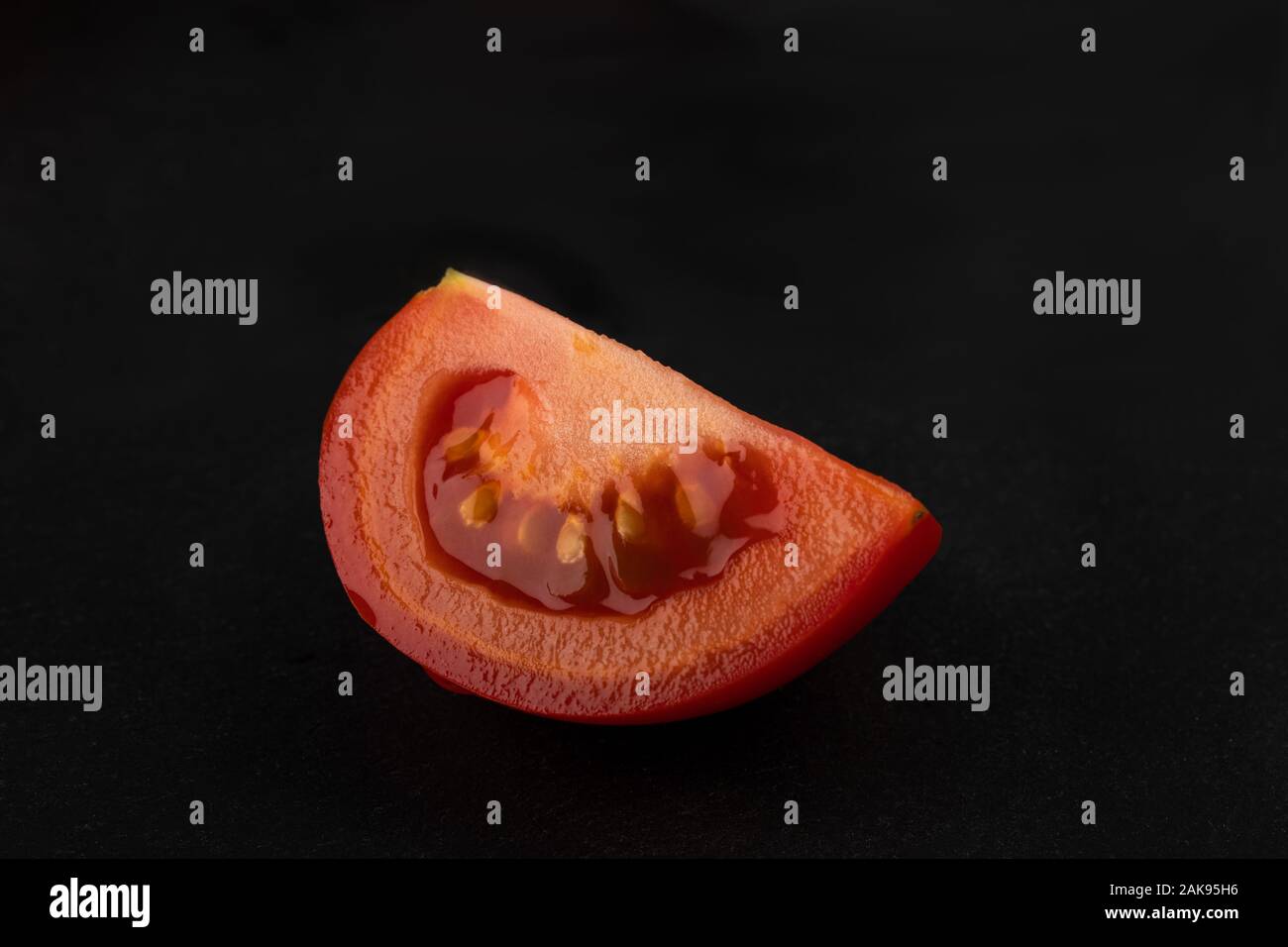 Half and quarter tomatoes hi-res stock photography and images - Alamy