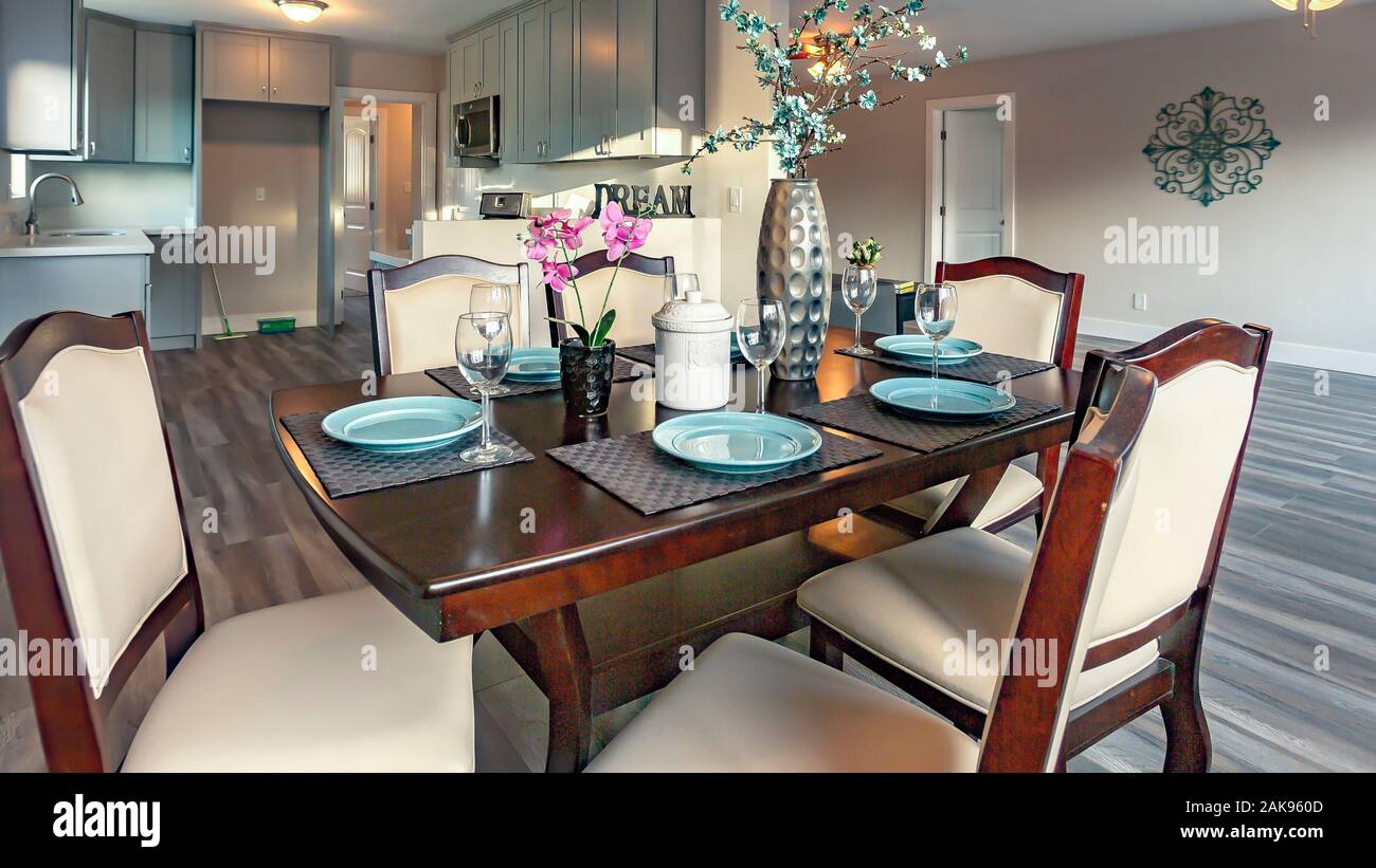 Panorama Twilight tones in the kitchen with table Stock Photo - Alamy