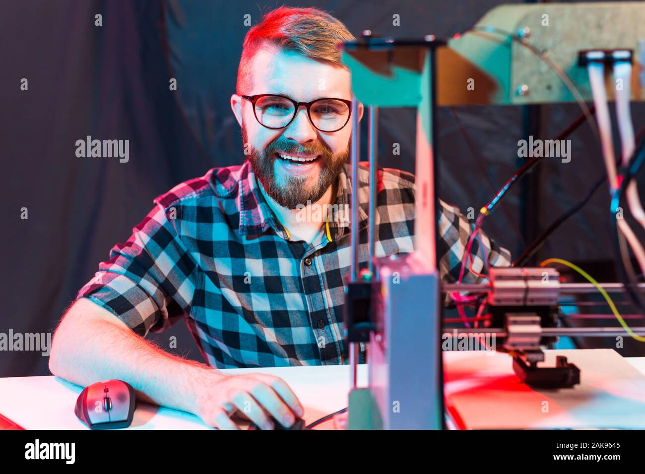 Technology and engineering concept - Male engineer working at night in ...