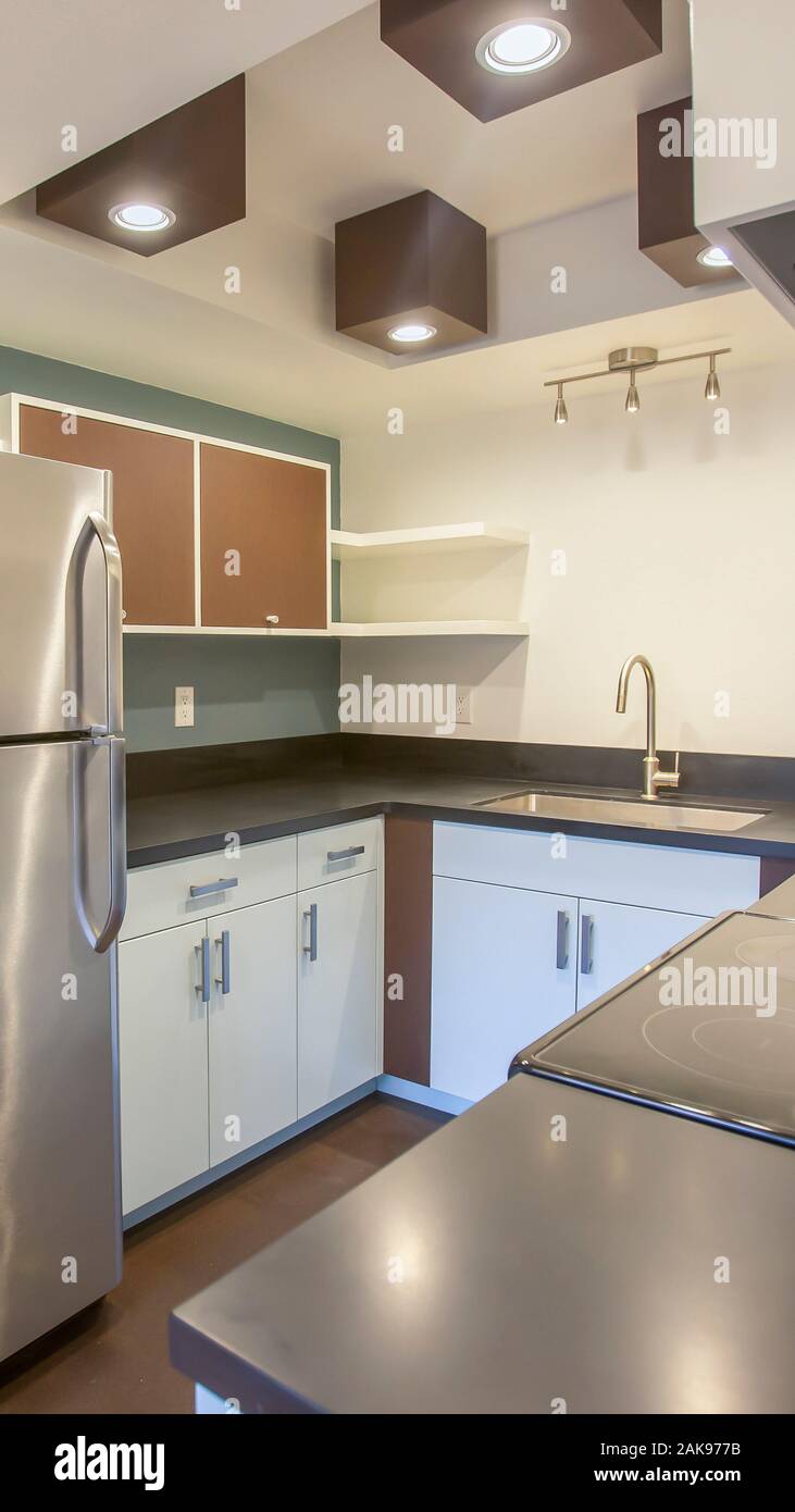 Vertical Modern kitchen with great design clean inside Stock Photo - Alamy