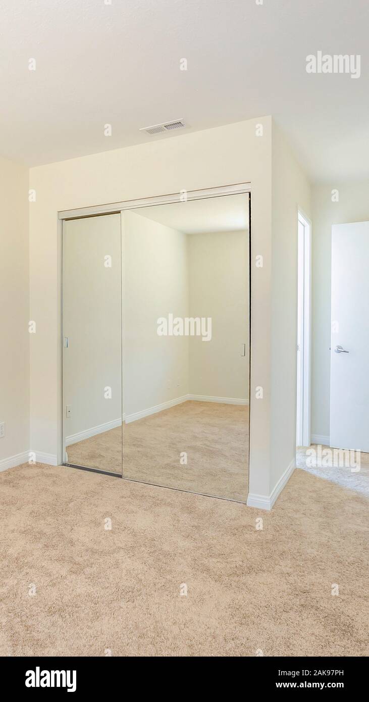 Vertical Empty bedroom with closet clean inside Stock Photo - Alamy