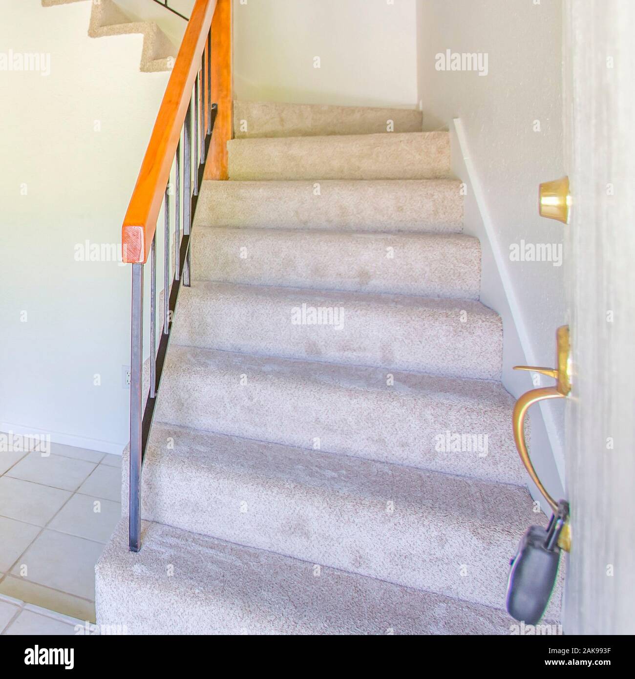 Square frame Living room from the view of the open front door Stock ...