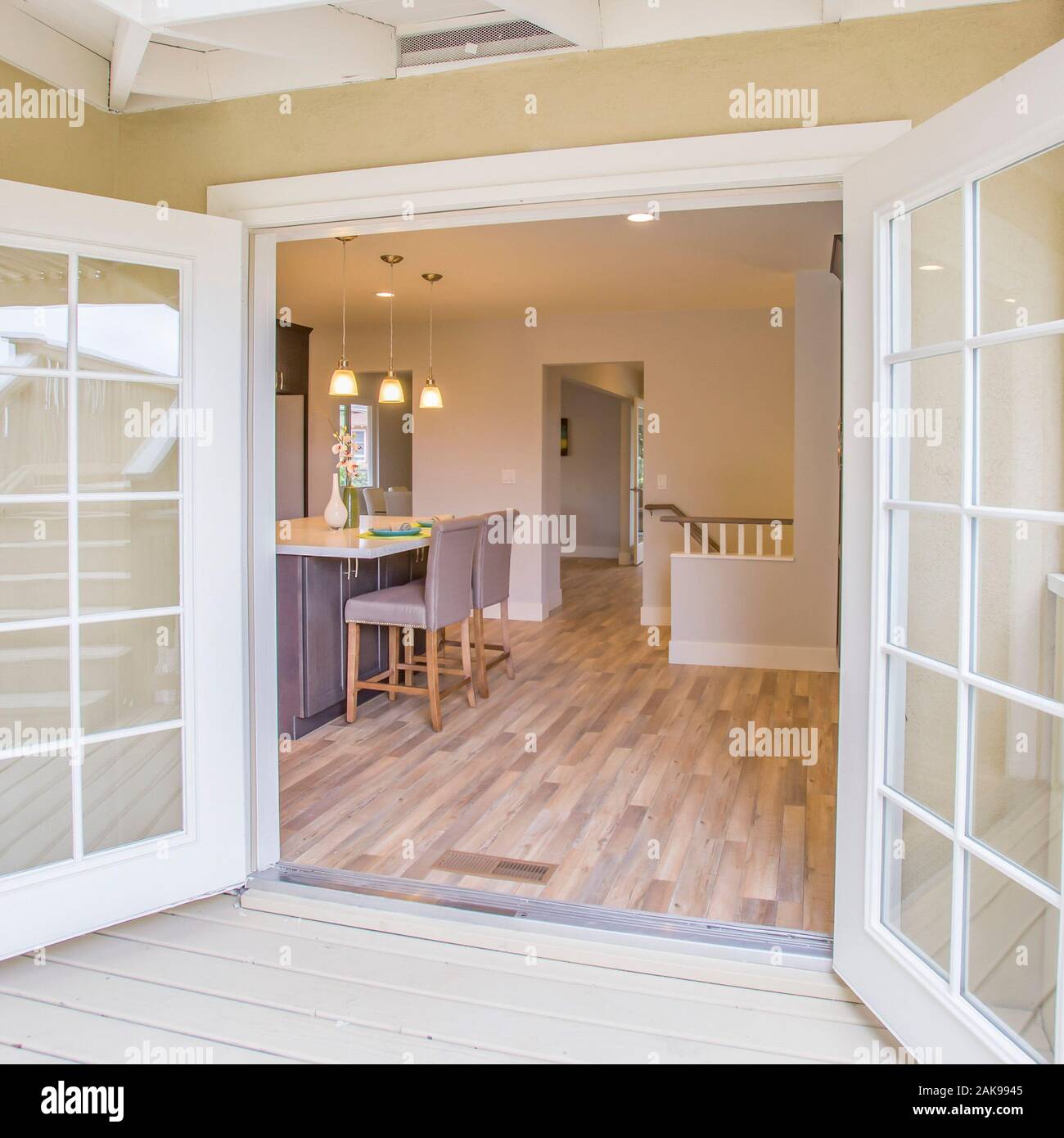 Square frame Wide open doors to the kitchen Stock Photo - Alamy