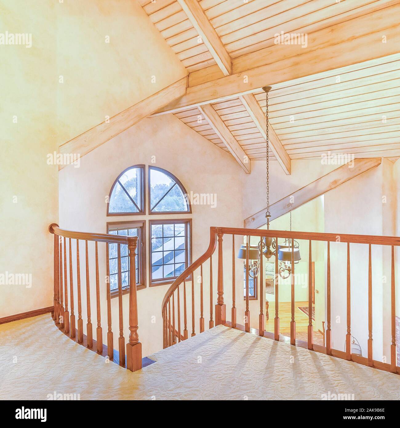 Square frame Bright, open and warm indoor balcony with vaulted ceilings ...