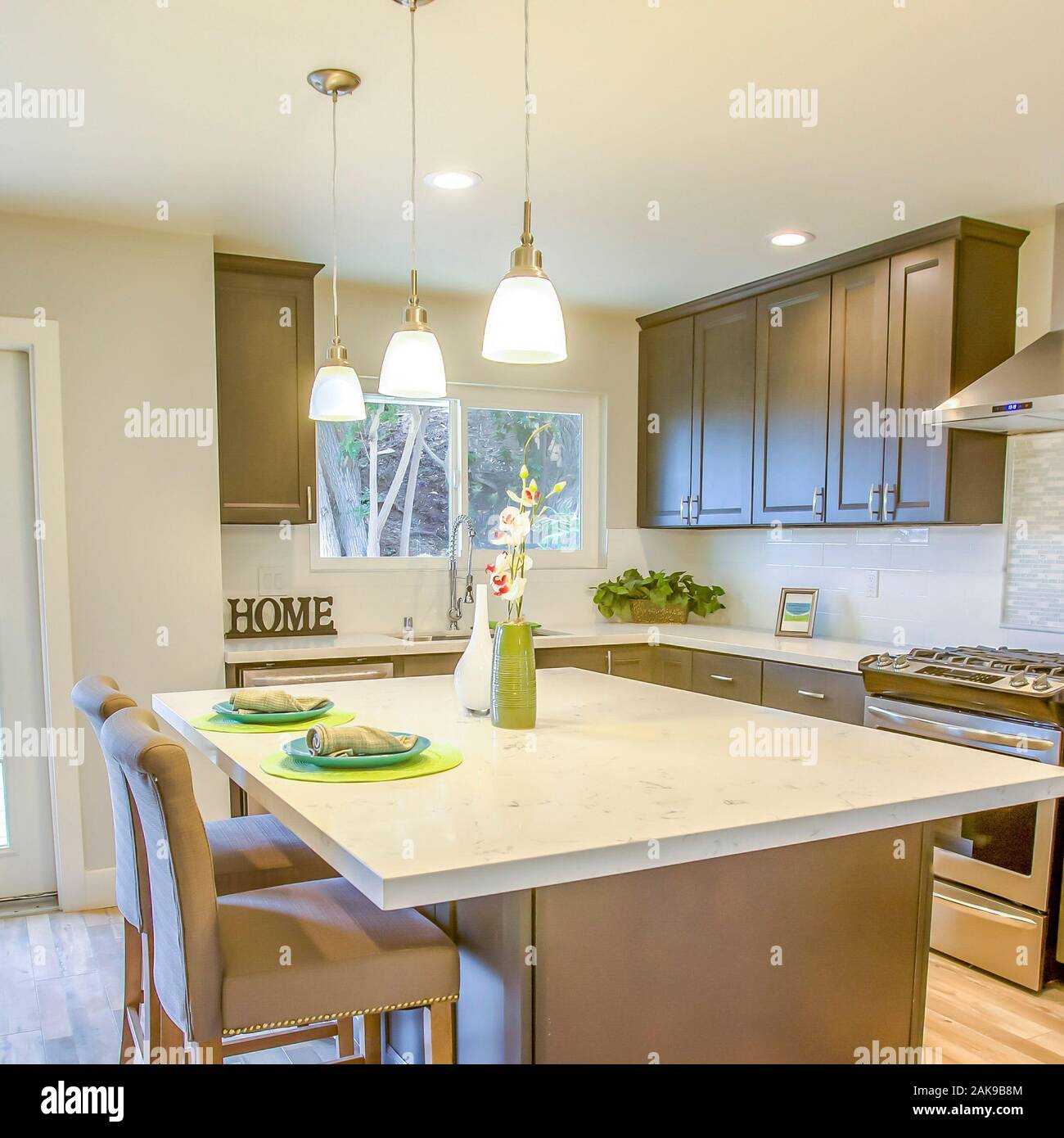 Square Wide angle of kitchen with wide bay doors Stock Photo - Alamy