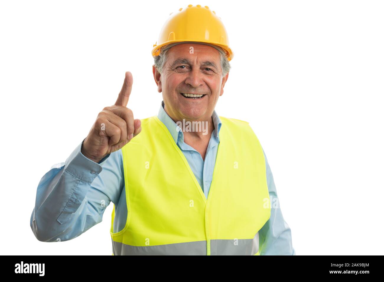 Old builder man smiling as making good idea gesture with index finger ...