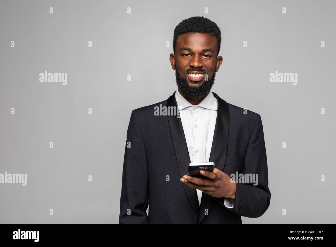 communication cell phone man sends a text message with his smartphone ...