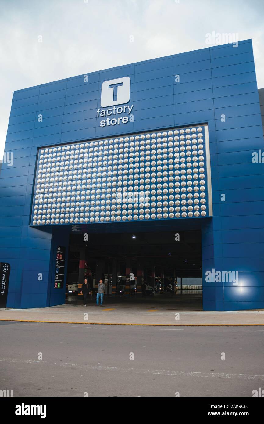 Facade and parking gate at Tramontina Factory Store building, a company ...