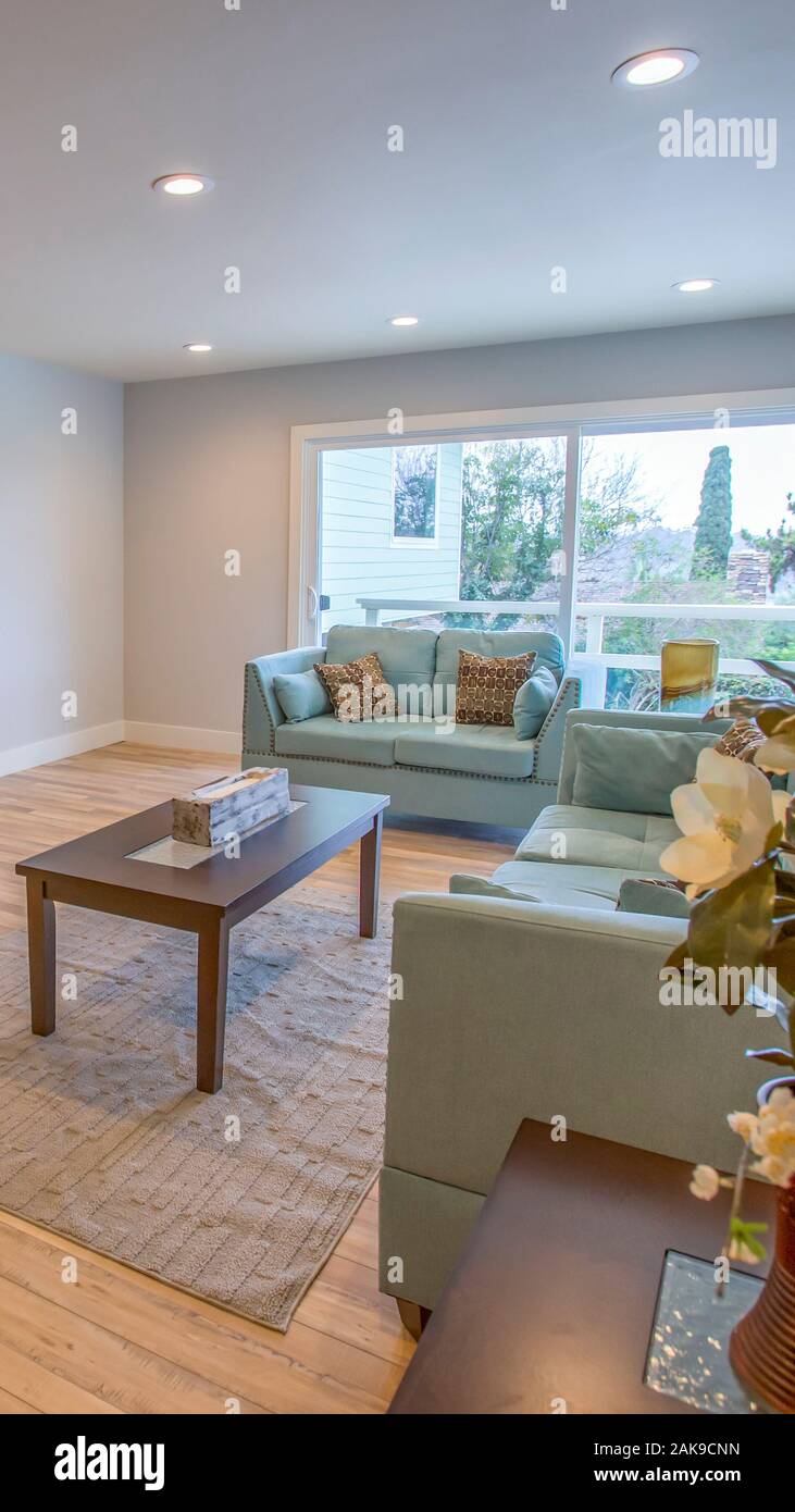 Couch vertical window wood floor hi-res stock photography and images ...