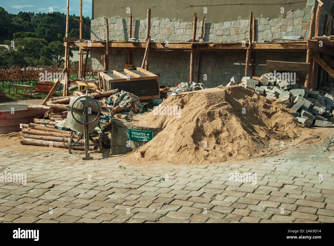 Mixing cement in a bucket hi-res stock photography and images - Alamy