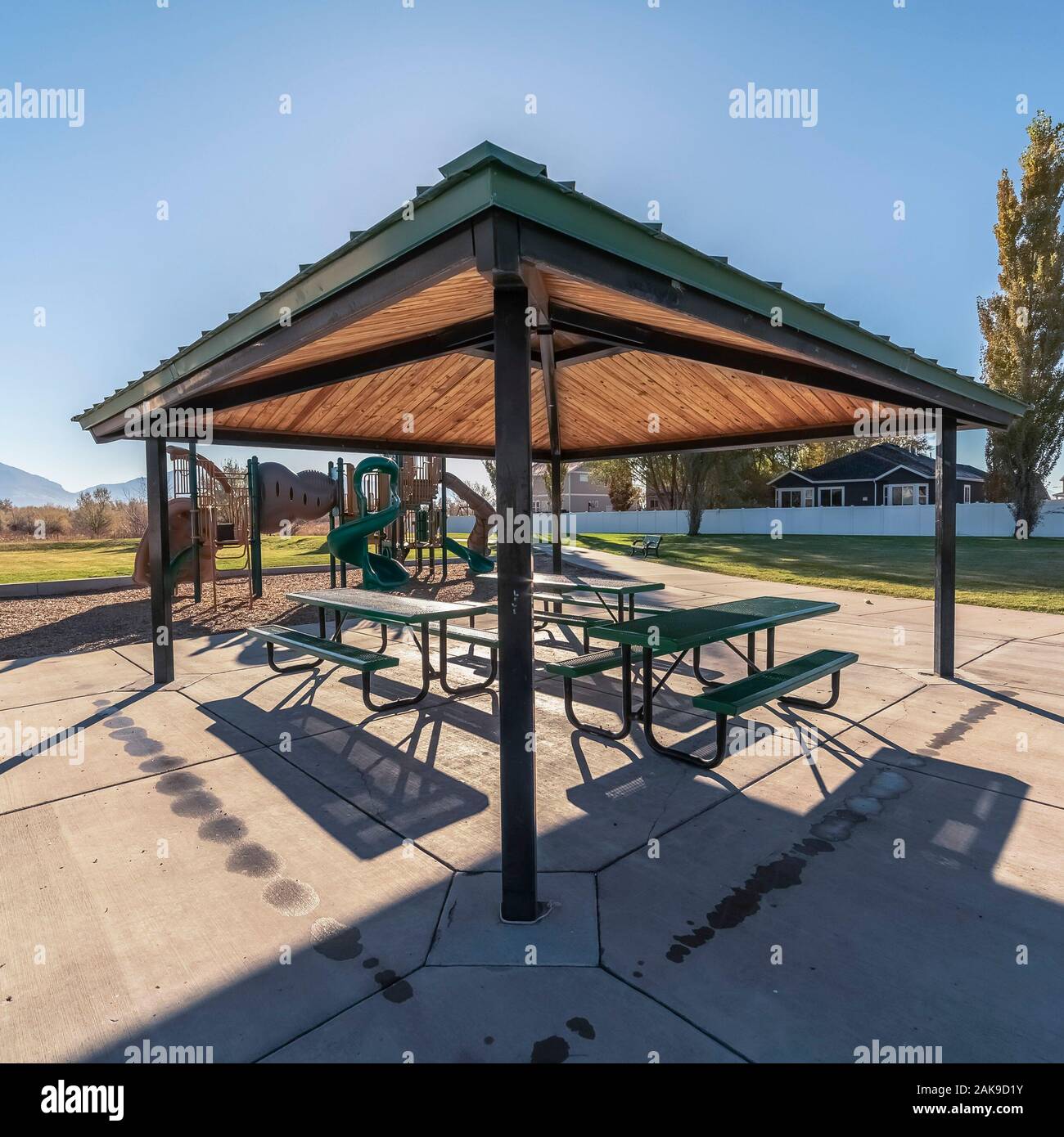 Square frame Outdoors covered tables and benches for a picnic Stock ...