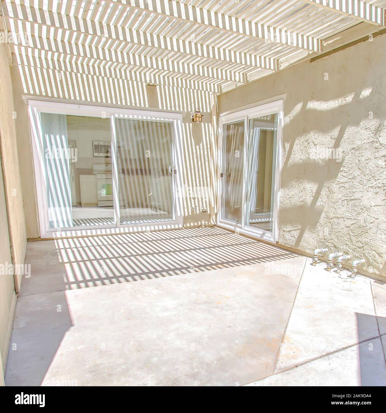 Square Outdoor patio mid day outdoors backyard Stock Photo - Alamy