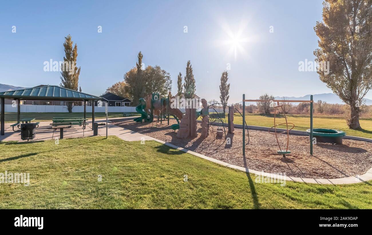 Panorama frame Kids playground with a covered picnic area Stock Photo ...