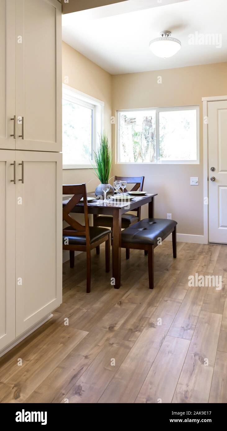 Vertical Kitchen table near the front door Stock Photo - Alamy