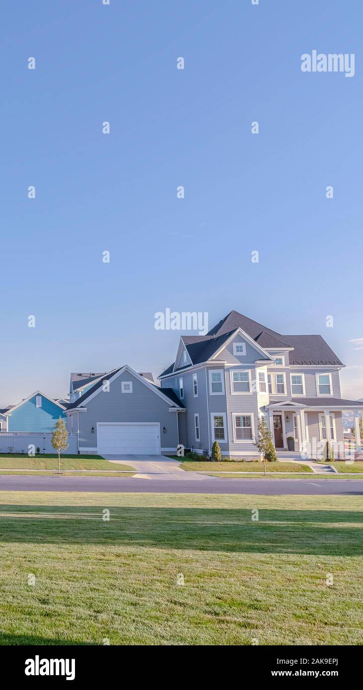 Vertical Street view of a modern urban housing estate Stock Photo - Alamy