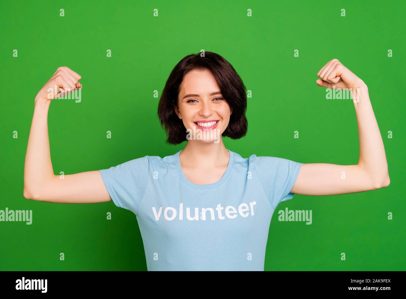 Strong woman demonstrating her muscles hi-res stock photography and ...