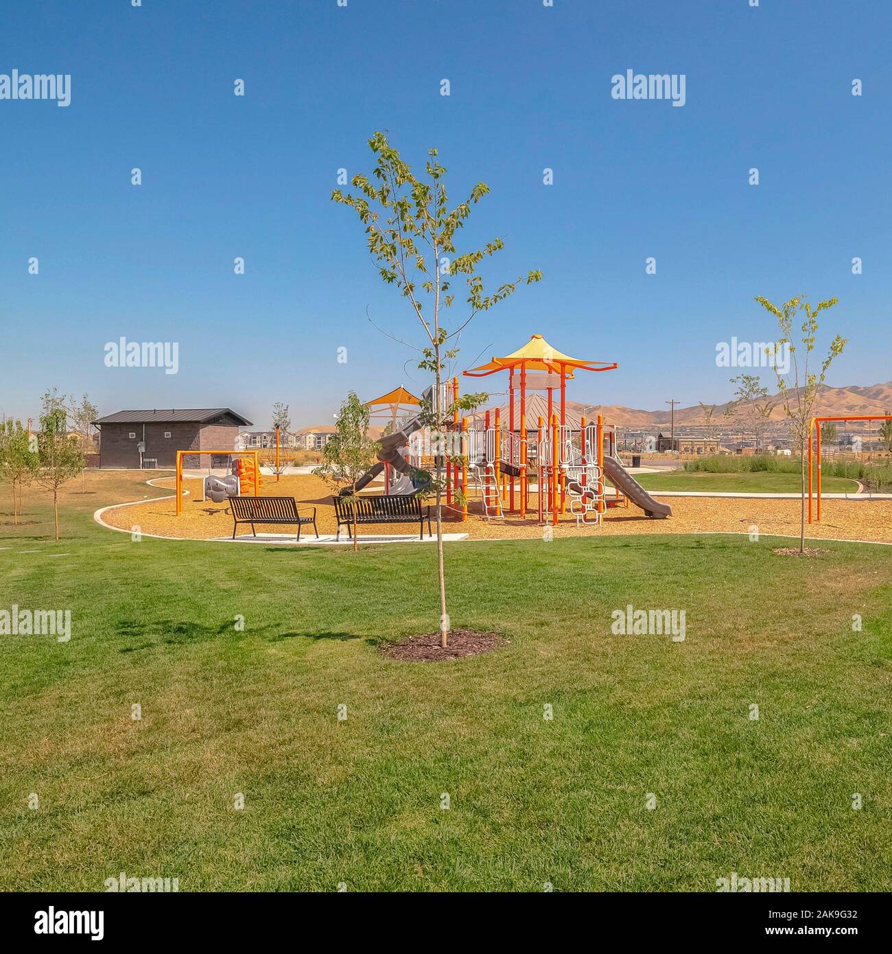Square frame Scenic park with picnic tables and benches and playground ...