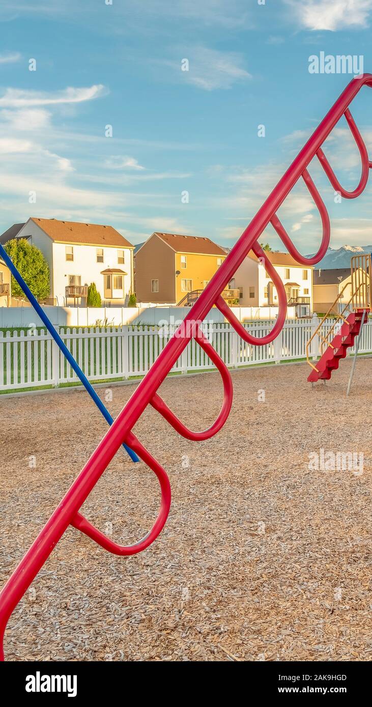 Vertical Fun playground for children with colorful slides swings and ...
