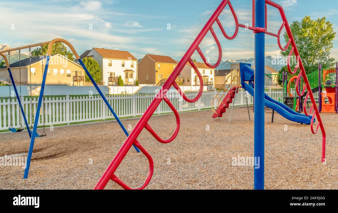 Pano frame Fun playground for children with colorful slides swings and ...