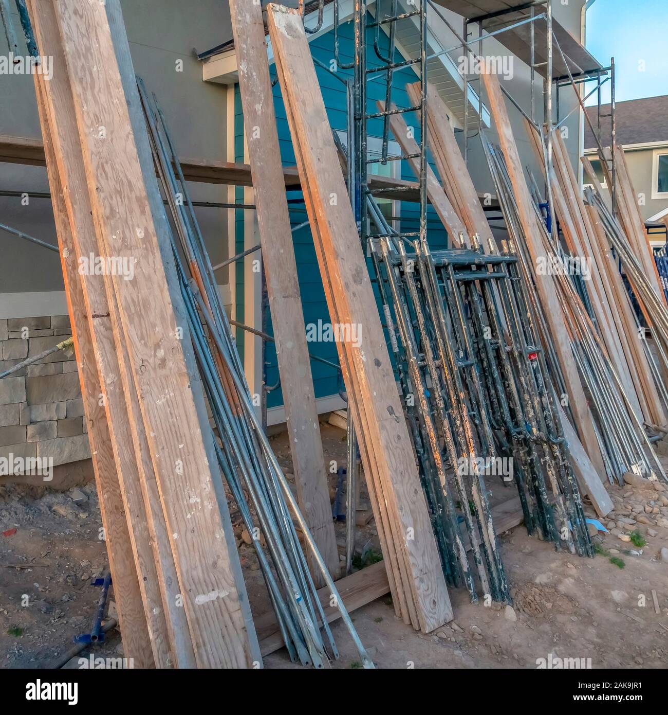 Square frame Construction materials and scaffolding against brick and ...