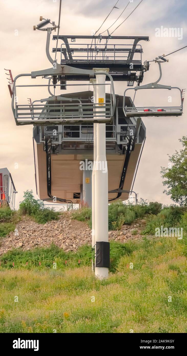 Vertical Chairlifts and chairlift terminal on top of a mountain in Park ...