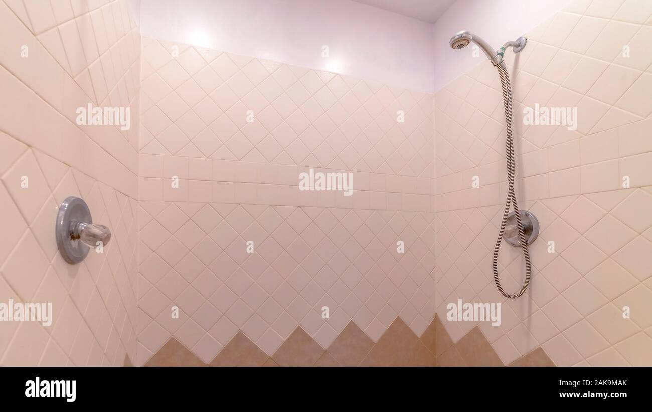 Pano frame Bathroom interior with shower installed on the wall with ...