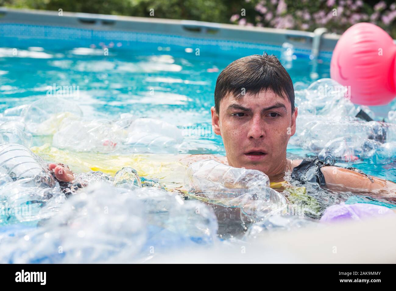 Ecology, plastic trash, environmental emergency and water pollution ...