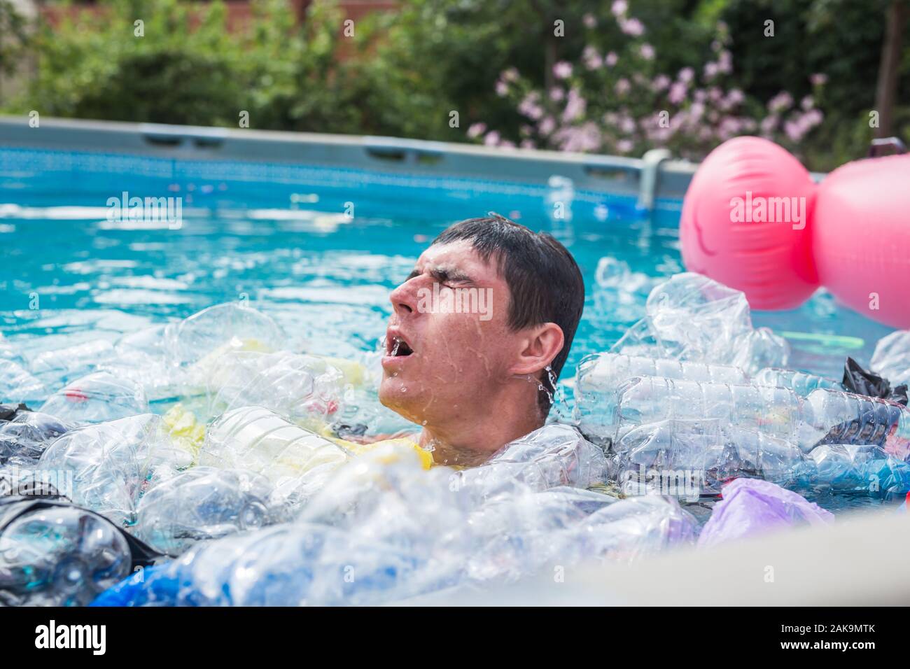 Ecology, plastic trash, environmental emergency and water pollution ...