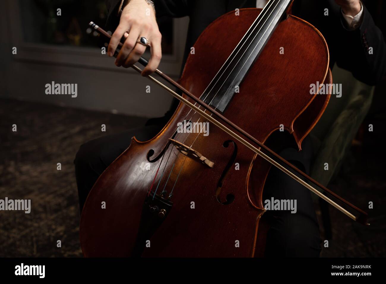 Close-up of double bass, wooden musical instrument that is played with ...