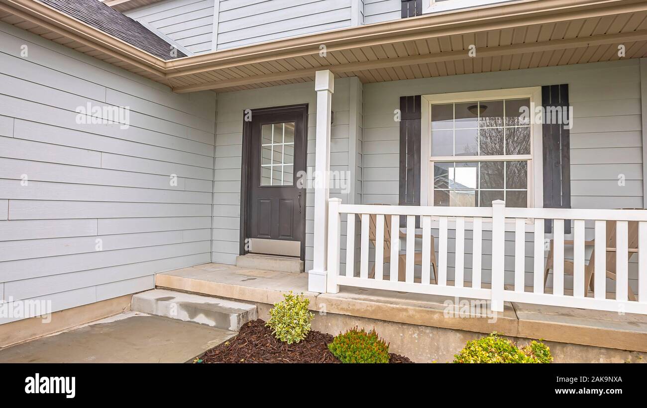 Pano Home with front porch glass panels on door and windows with wooden ...