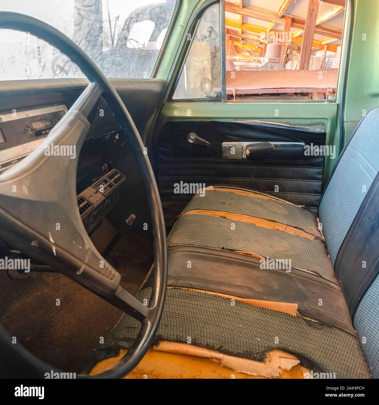 Square frame Old vintage car with close up of the steering wheel and ...