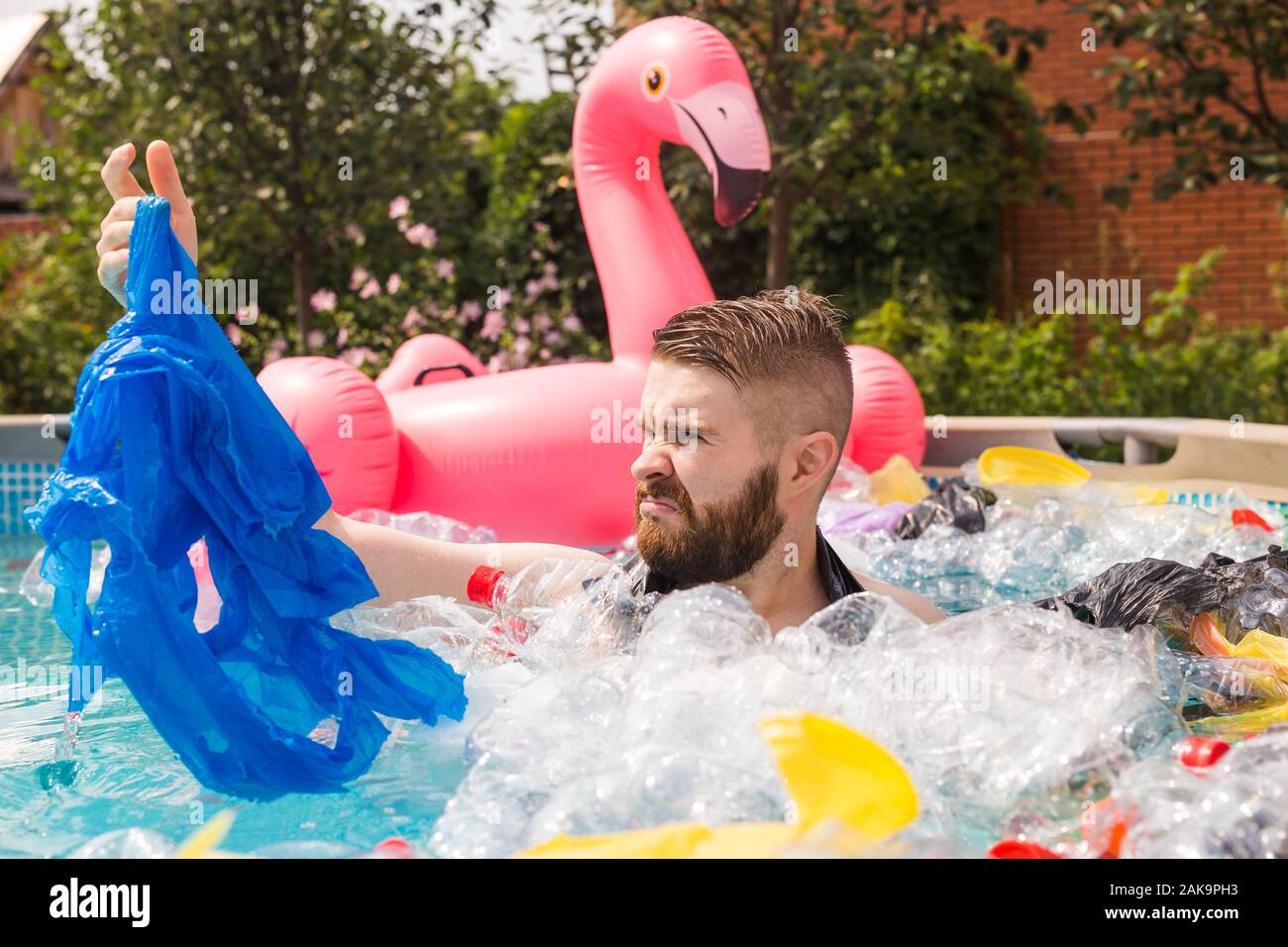 Ecology, plastic trash, environmental emergency and water pollution ...