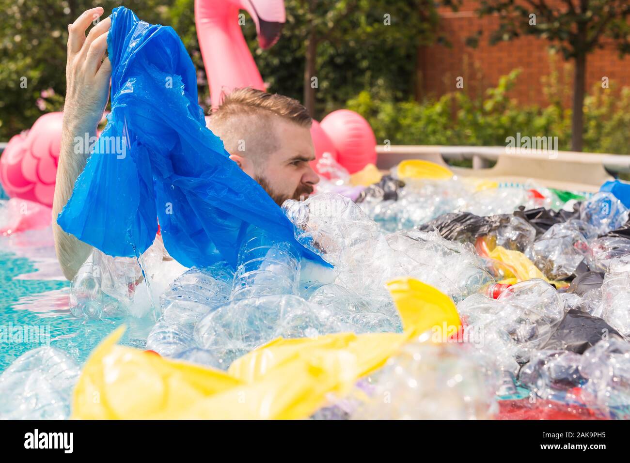 Ecology, plastic trash, environmental emergency and water pollution ...