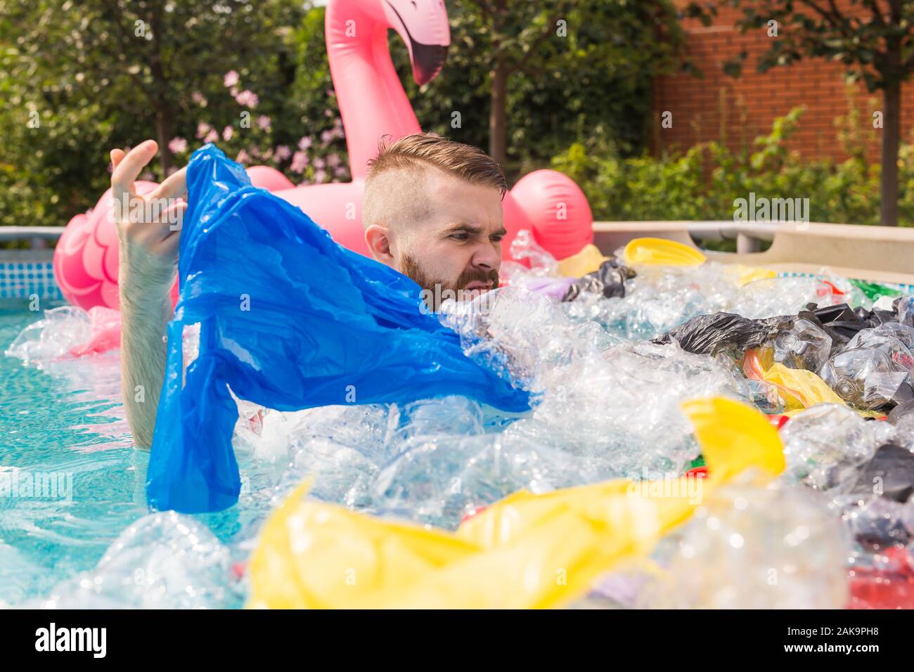 Ecology, plastic trash, environmental emergency and water pollution ...