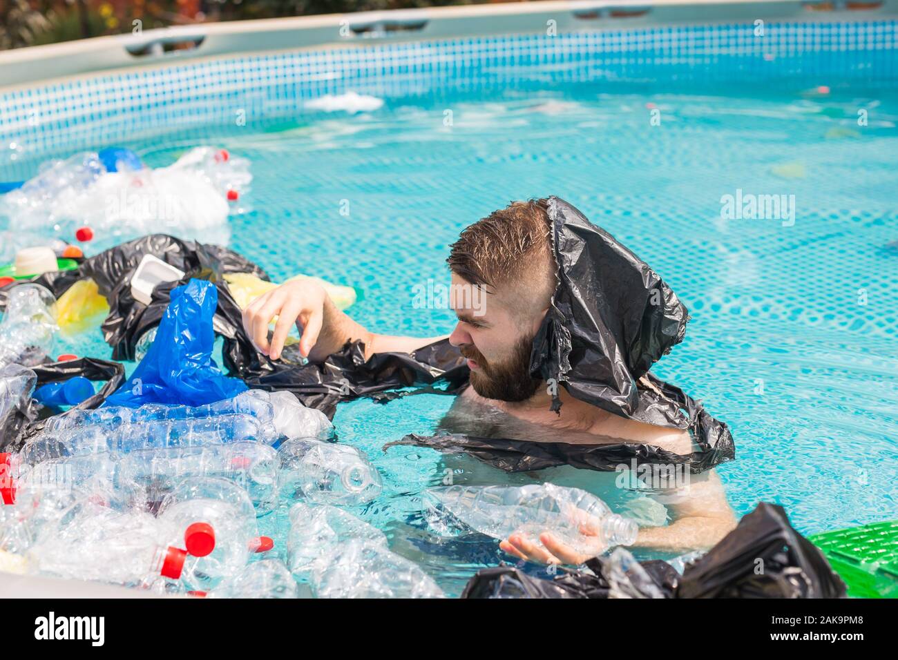 Ecology, plastic trash, environmental emergency and water pollution ...