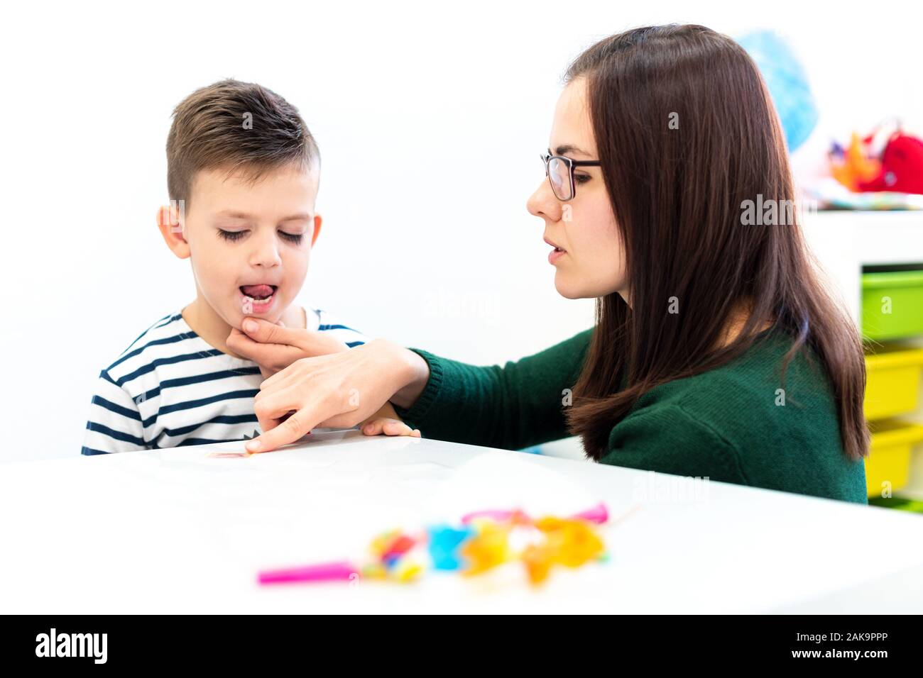 Children speech therapy concept. Preschooler practicing correct ...