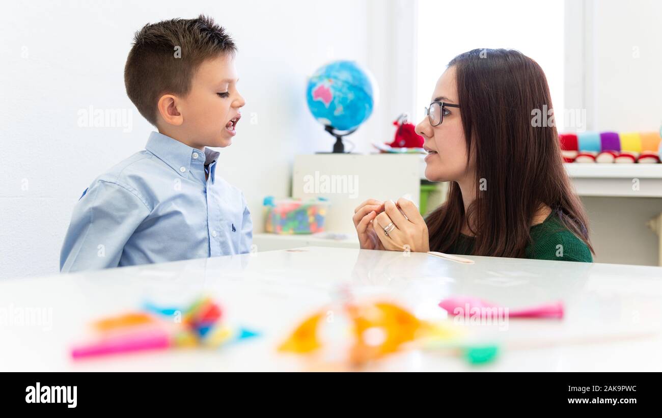 Children speech therapy concept. Preschooler practicing correct ...