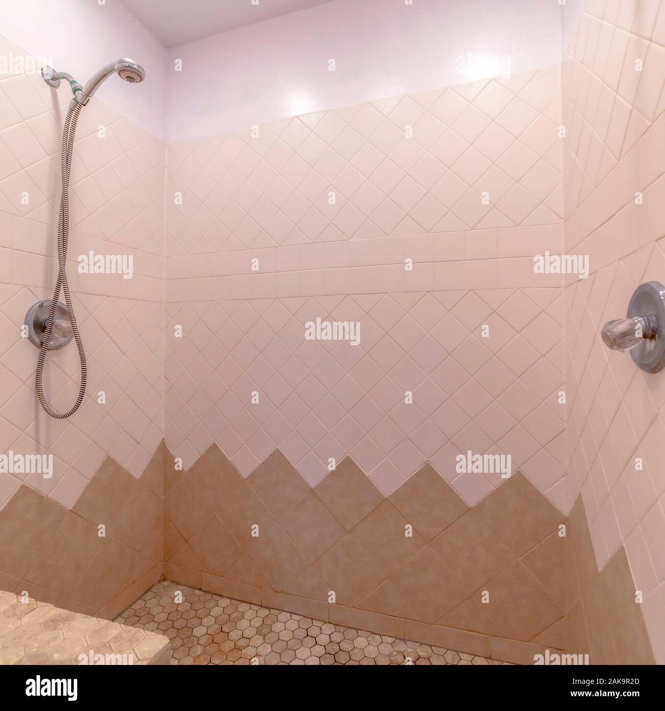 Square frame Bathroom interior with shower installed on the wall with ...