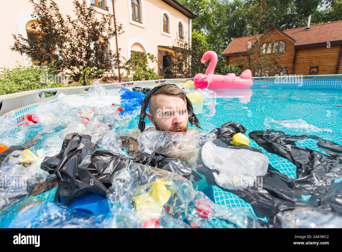 Ecology, plastic trash, environmental emergency and water pollution ...