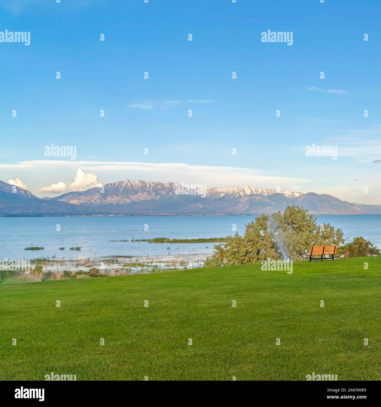 Square frame Nature landscape with lake and snow capped mountain ...