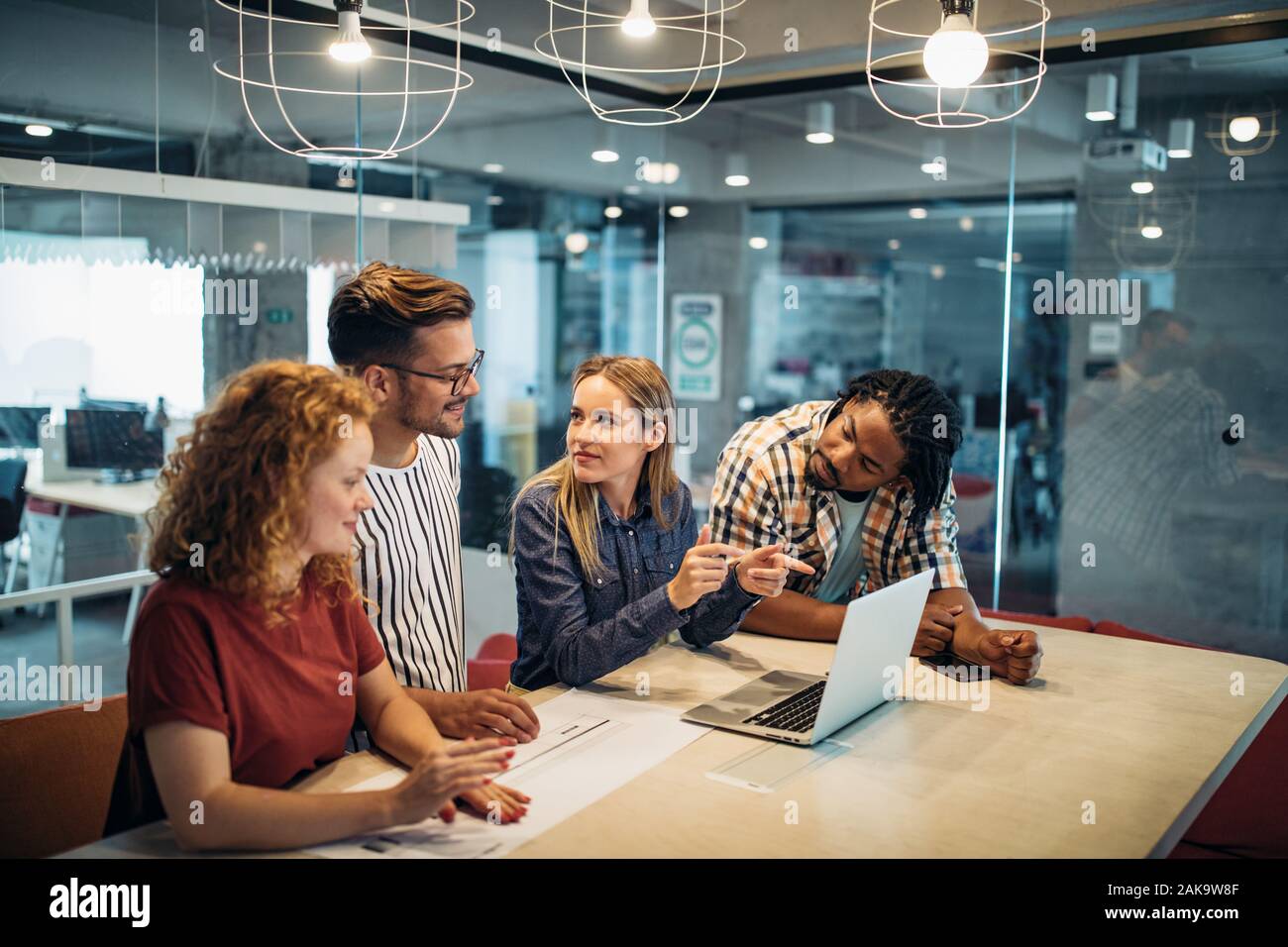 Successful group of designers, business people at work in office Stock ...