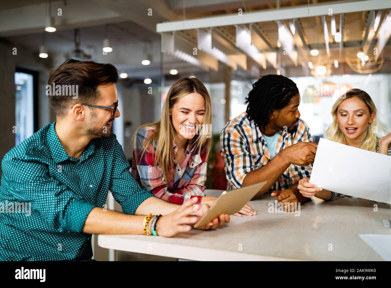 Successful group of designers, business people at work in office Stock ...
