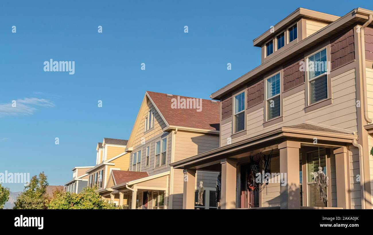 Panorama frame Row of urban houses with front porches Stock Photo - Alamy