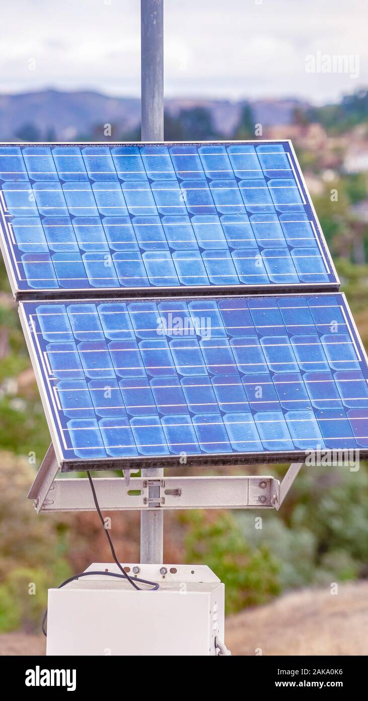 Vertical Solar panel for sustainable green energy on a cloudy day Stock ...